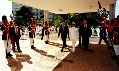Secretary Cohen is escorted into the Navy Headquarters, Brasilia, Brazil, by Adm. Cesar. | U.S ...