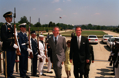 Secretary Cohen escorts Steven Spielberg through a military honor ...