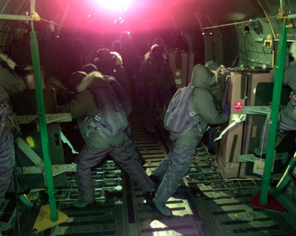 Air Force loadmasters brave minus-100 degree temperatures to push cargo ...
