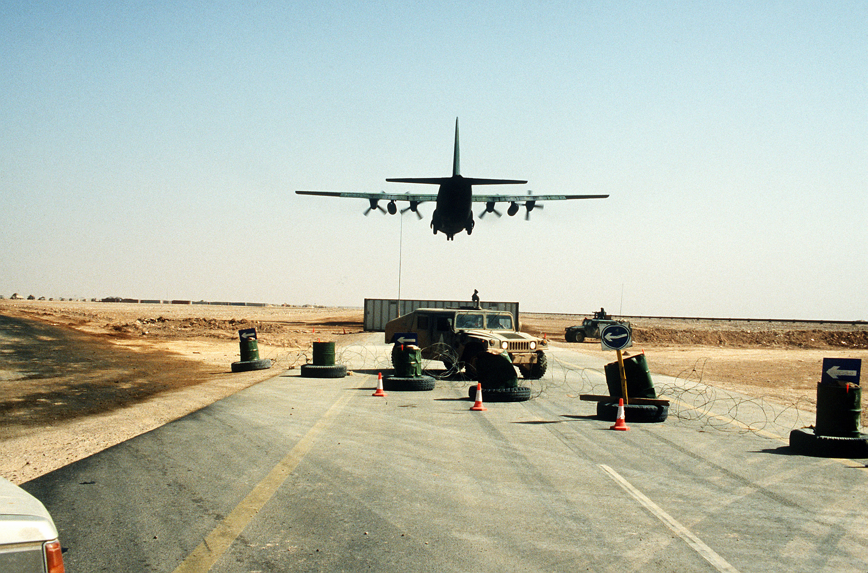 C-130 Hercules transport aircraft loaded with troops