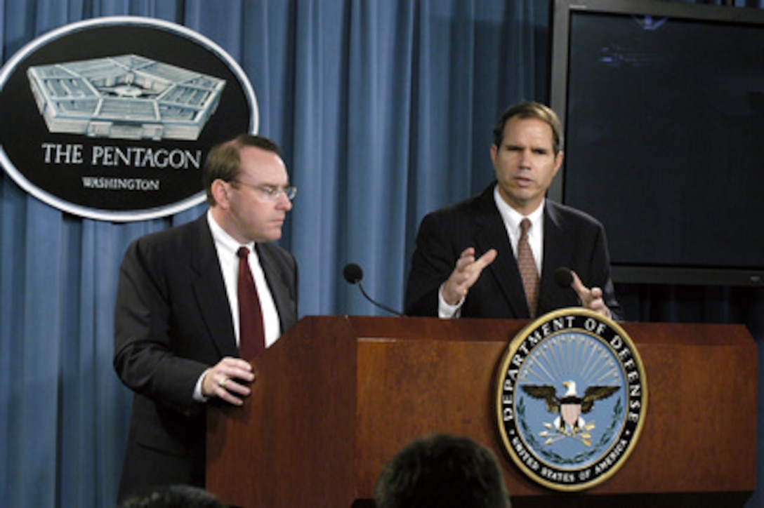 Thomas E. Laux responds to a reporter's question during a Pentagon ...