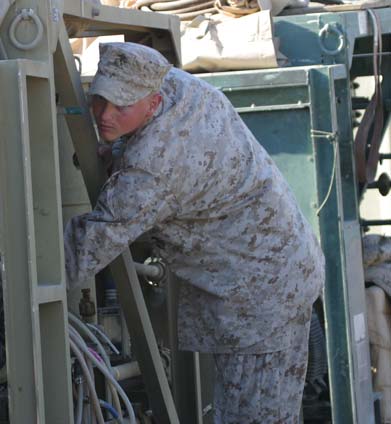 Water point provides valuable commodity ; > 2nd Marine Division > Article