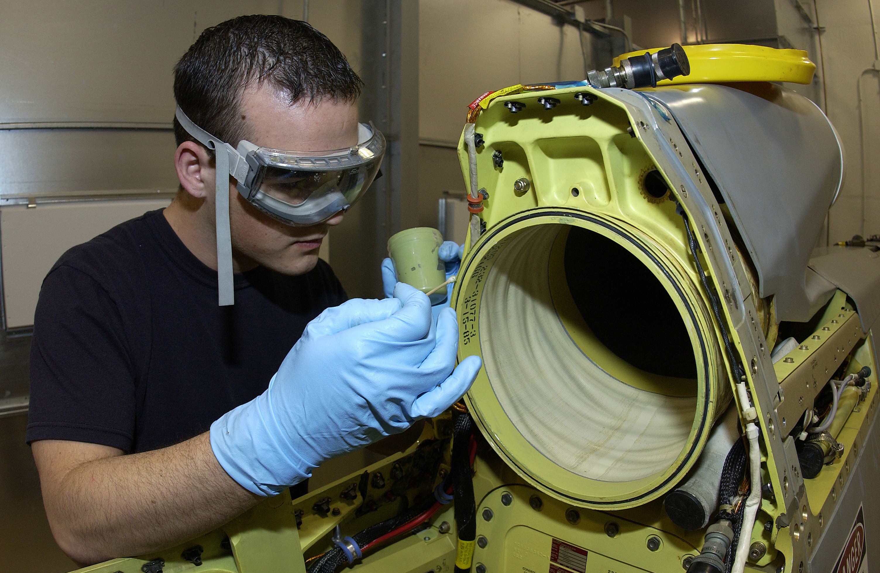 Airman installs new missile engine