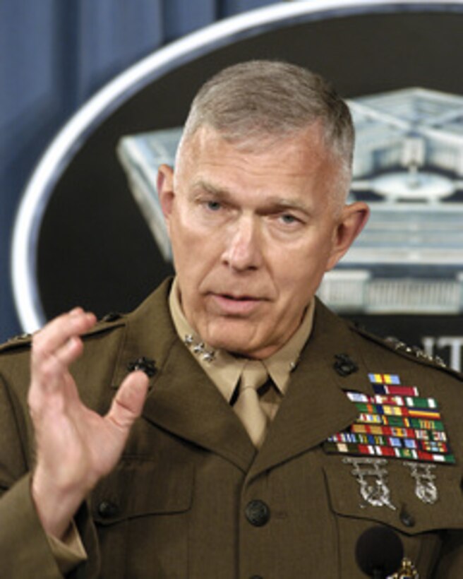 Lt. Gen. James T. Conway, U.S. Marine Corps, responds to a reporter's ...