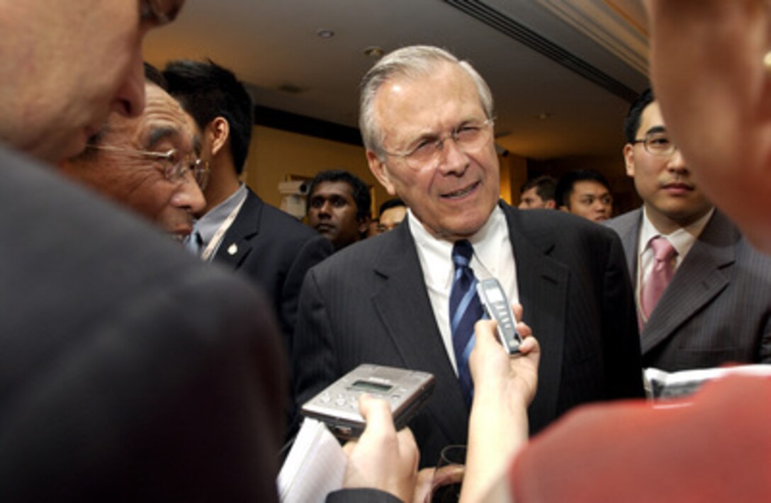 Secretary Of Defense Donald H Rumsfeld Speaks With Members Of The Press
