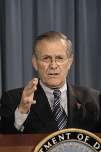 Secretary of Defense Donald H. Rumsfeld responds to a reporter's ...