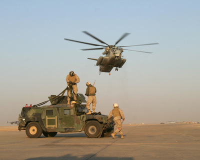 U.S. Marines make final preparations to a Humvee.