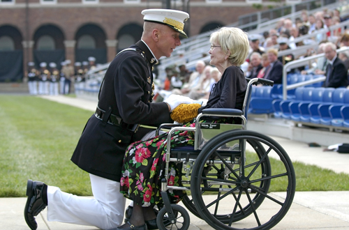 Margaret Myers, widow of U.S. Marine Maj. Reginald R. Myers, receives a ...