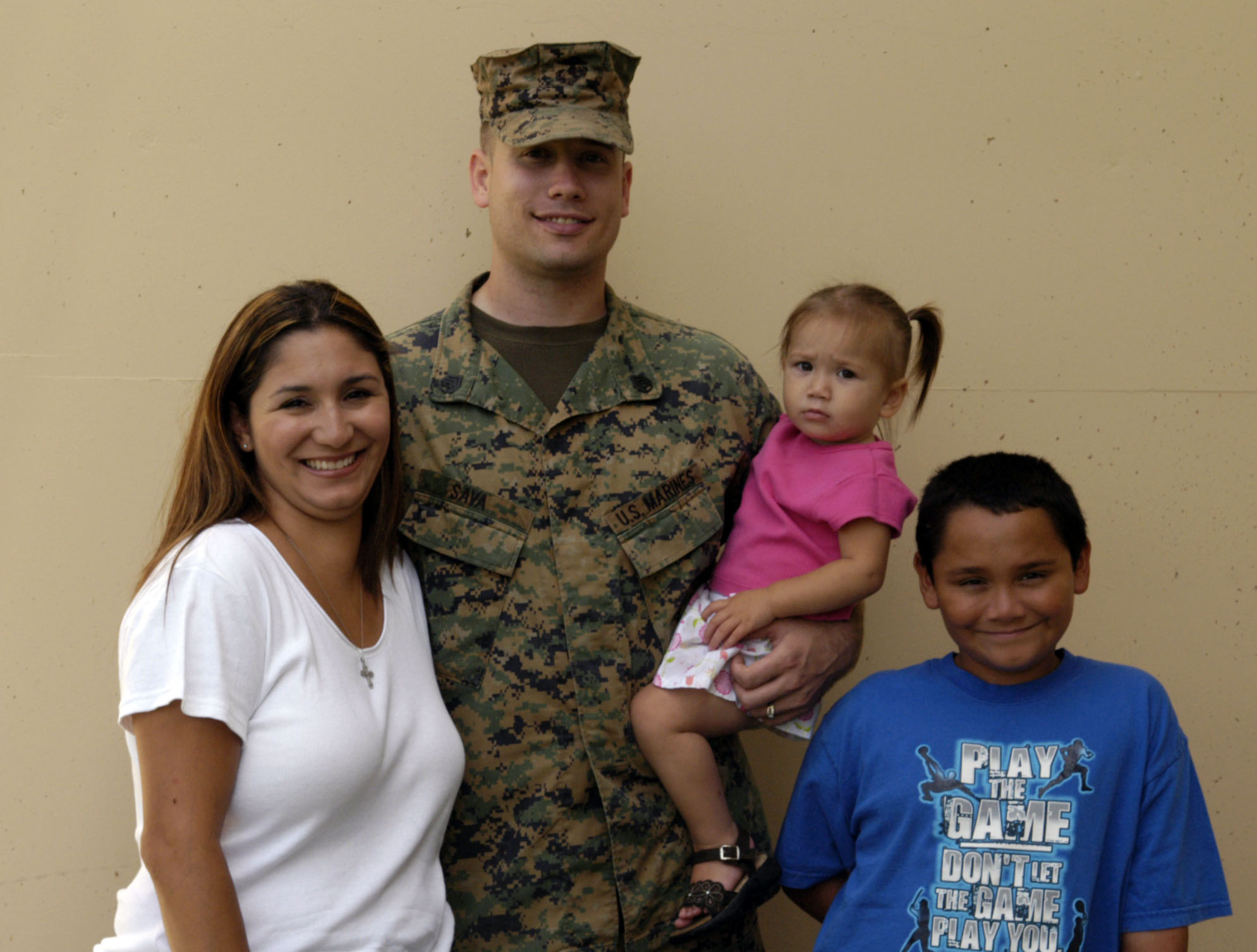 The Sava family, U.S. Marine Corps Staff Sgt. Danny Sava, his wife ...