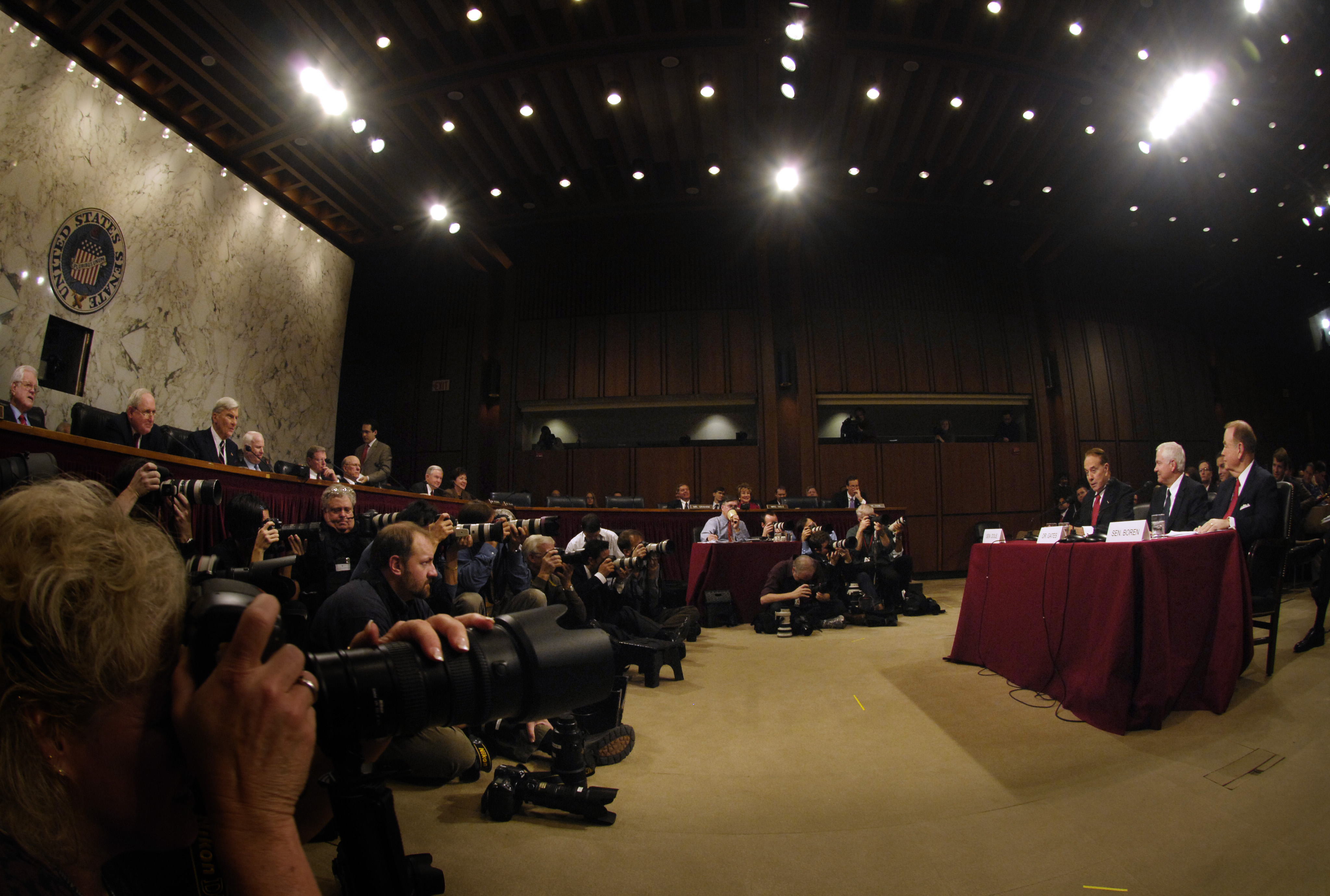 Right to left, Sen. David Boren, Dr. Robert Gates, and Sen. Bob Dole ...