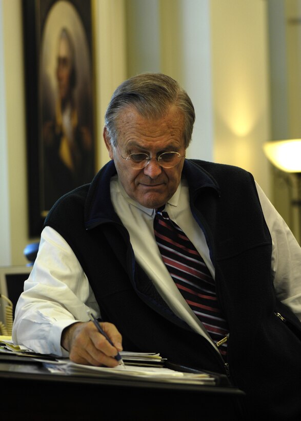 Defense Secretary Donald H Rumsfeld Reviews His Speech During His