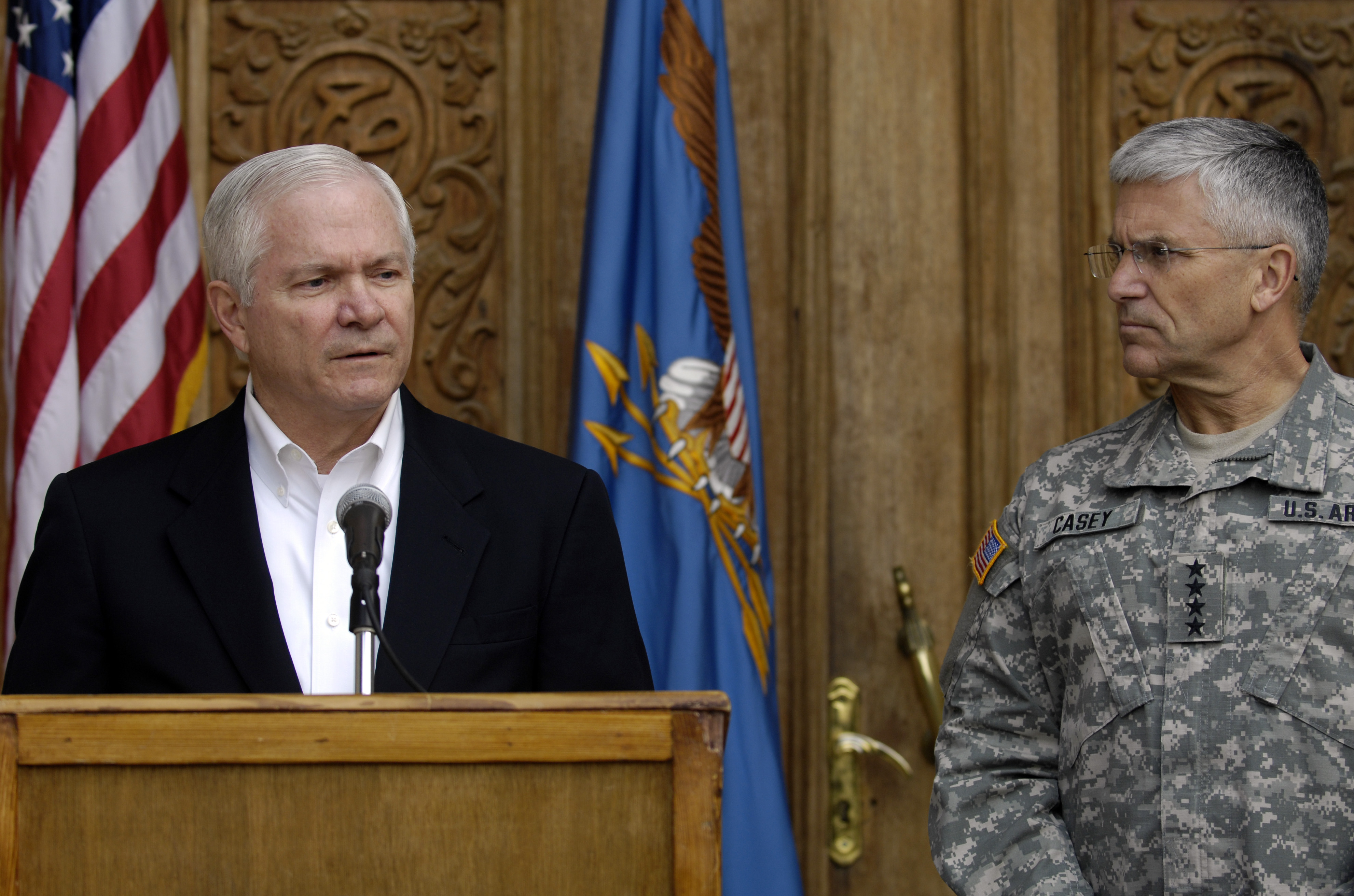 Defense Secretary Robert Gates responds to a question as Gen. George ...