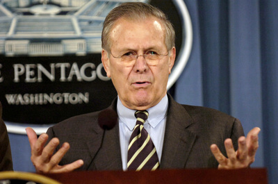 Secretary of Defense Donald H. Rumsfeld answers a reporter's question.