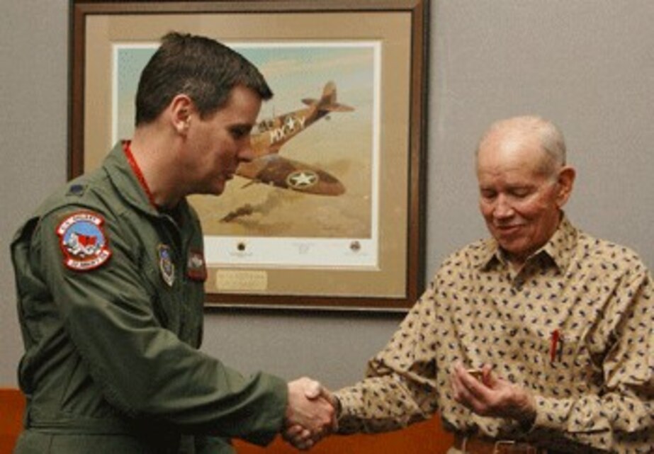 Retires fighter ace's visit reminds 22nd AS of unit, military history ...