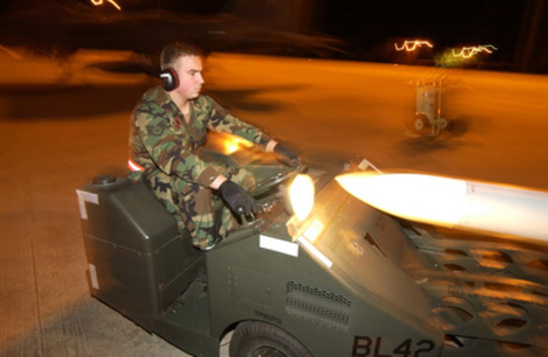 Air Force Staff Sgt. Ryan Manfull drives an MJ1 bomb loader. | U.S ...