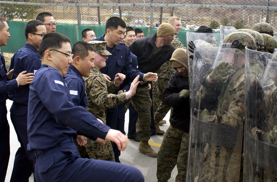 Get back! Marines, ROK forces train in riot control scenario during ...