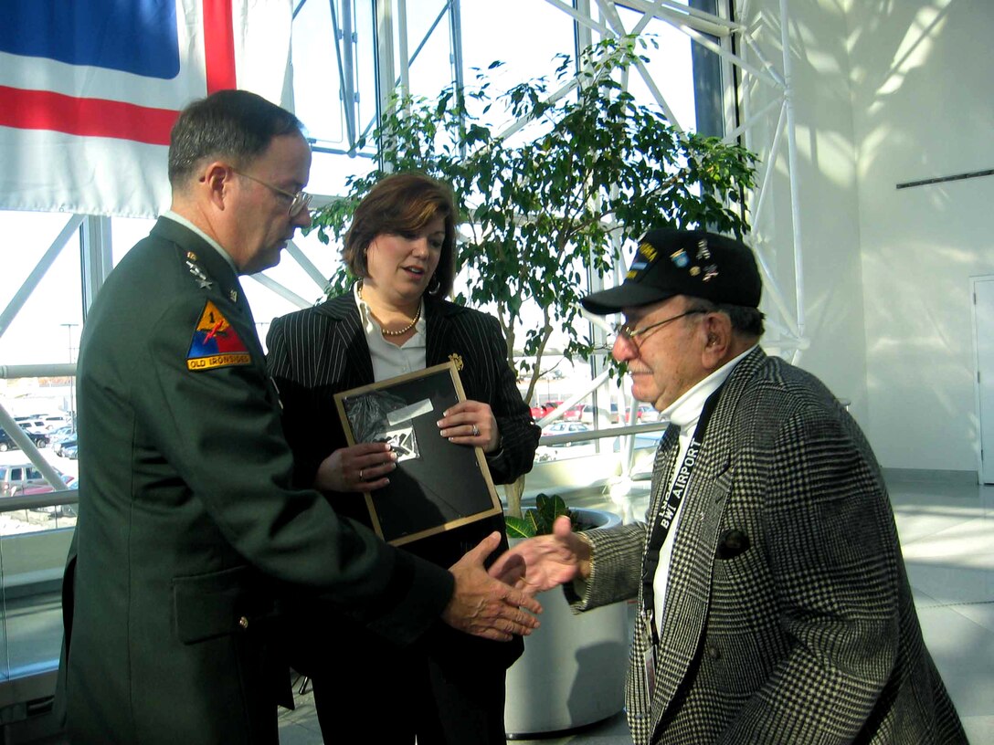 Army Lt. Gen. Keith B. Alexander (left), director of the National ...