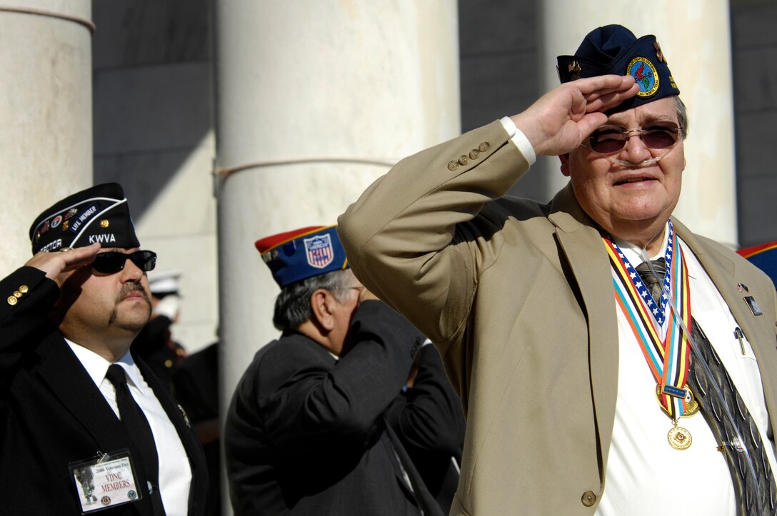 Korean War veteran Ed Buckman, from Hurst, Texas, right, and Jeffrey ...