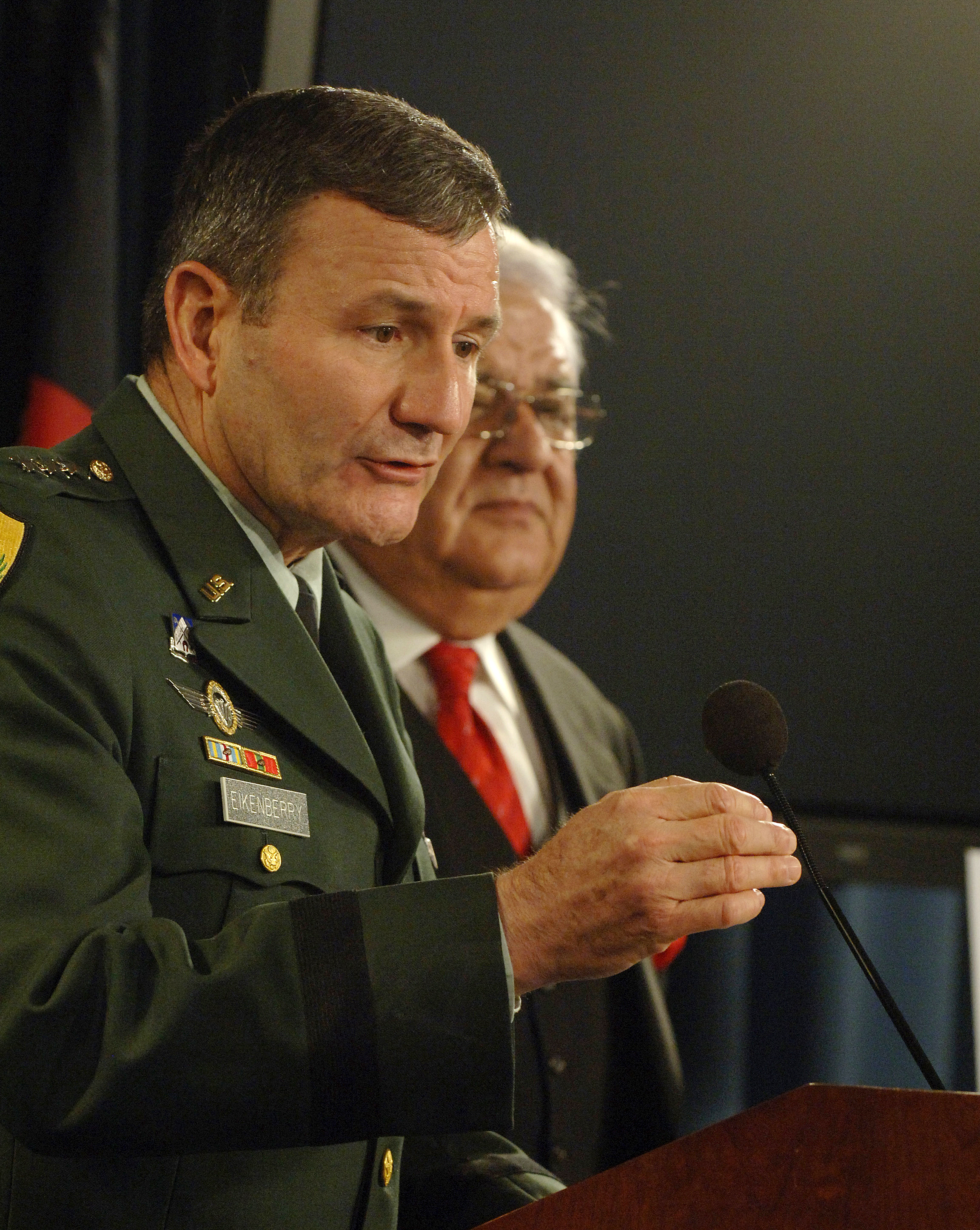 U.S. Army Lt. Gen. Karl Eikenberry, left, commanding general of ...