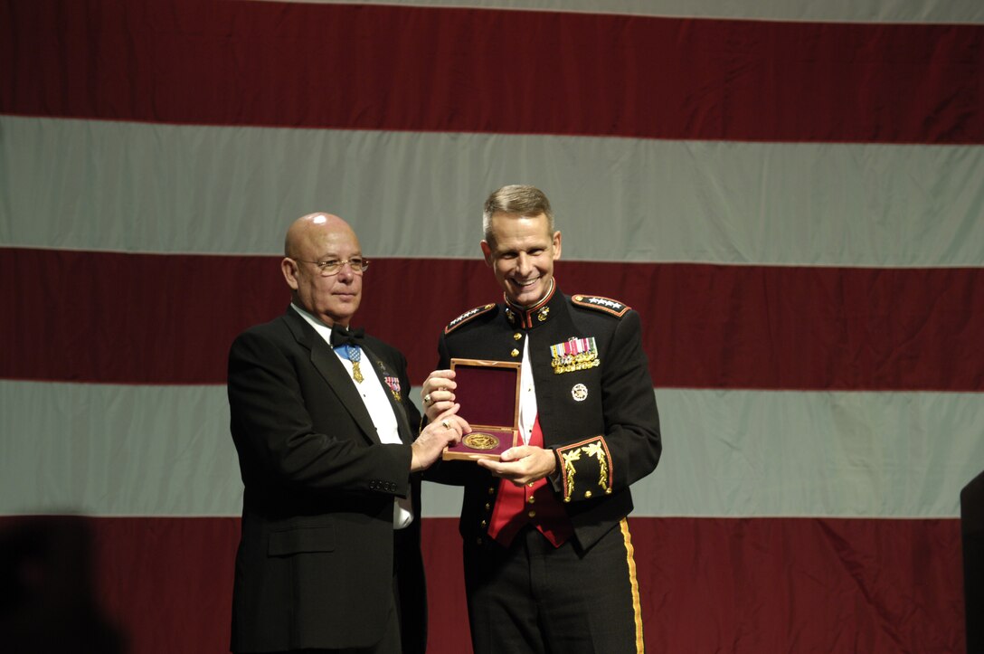 Chairman of the Joint Chiefs of Staff, Gen. Peter Pace, is presented ...