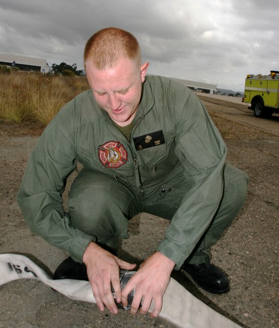 Train like you fight;Fire fighters hone aircraft fire skills > Marine ...