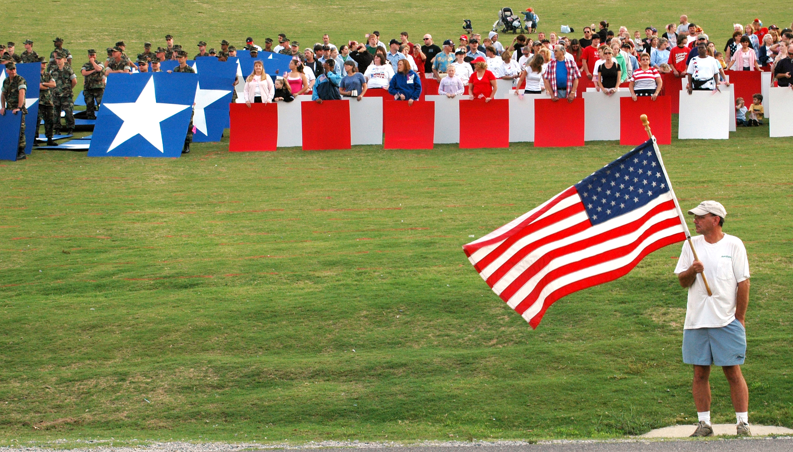 Barry Birkenmeyer holds up the American fag during the 9/11 Hampton ...