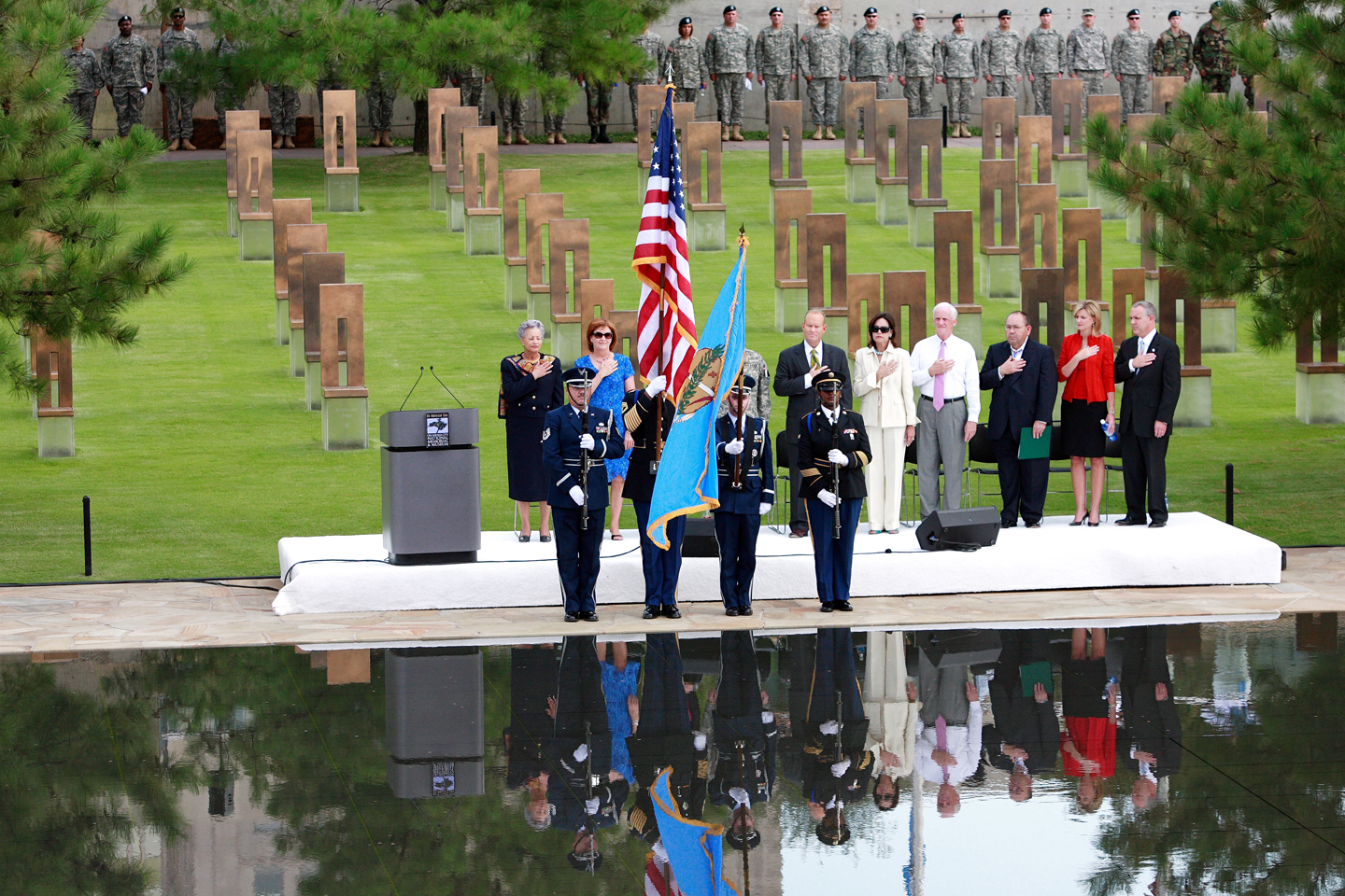 The Oklahoma National Guard color guard presents the colors during the ...