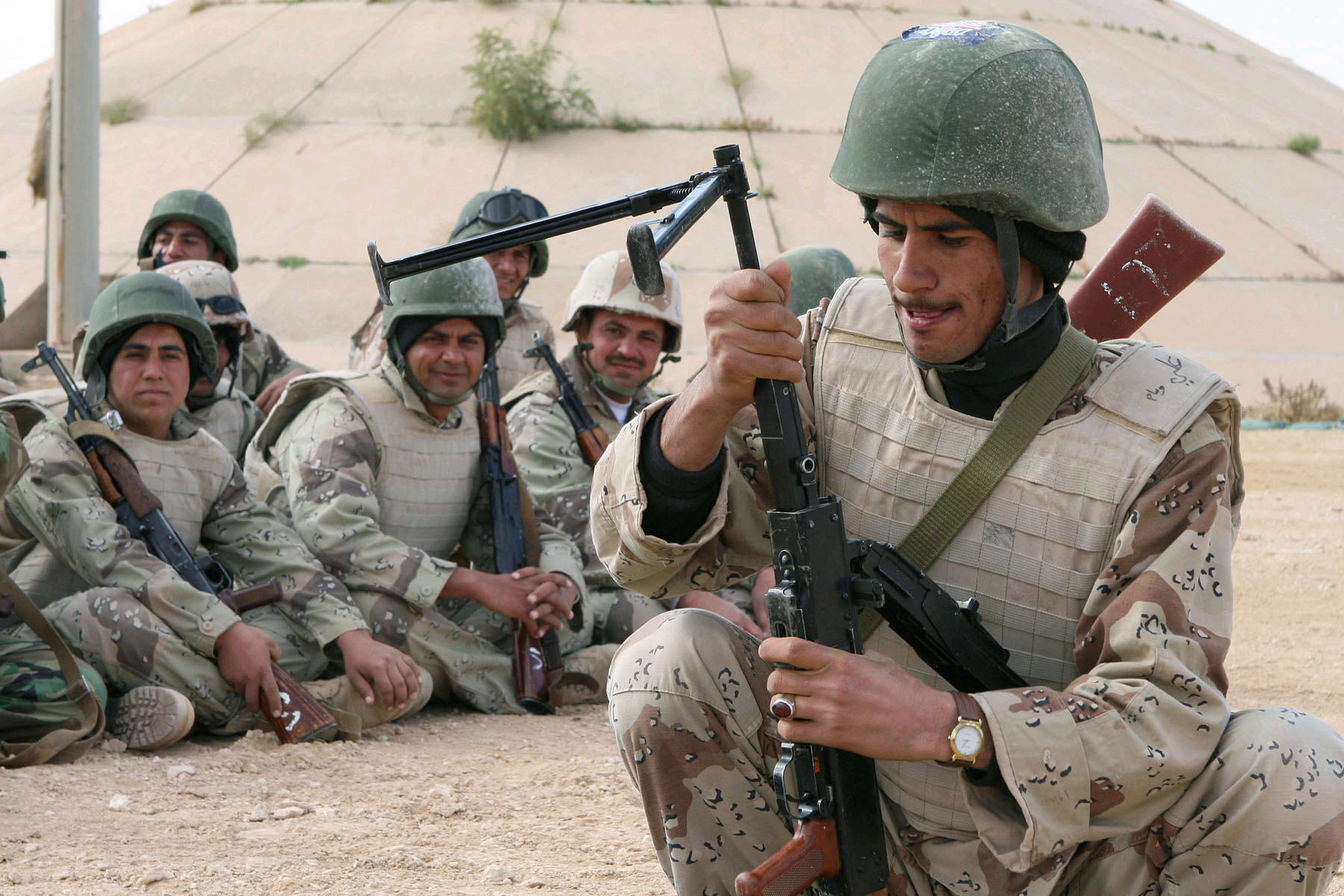 Directly following a class on the PKC machine gun, students in the ...