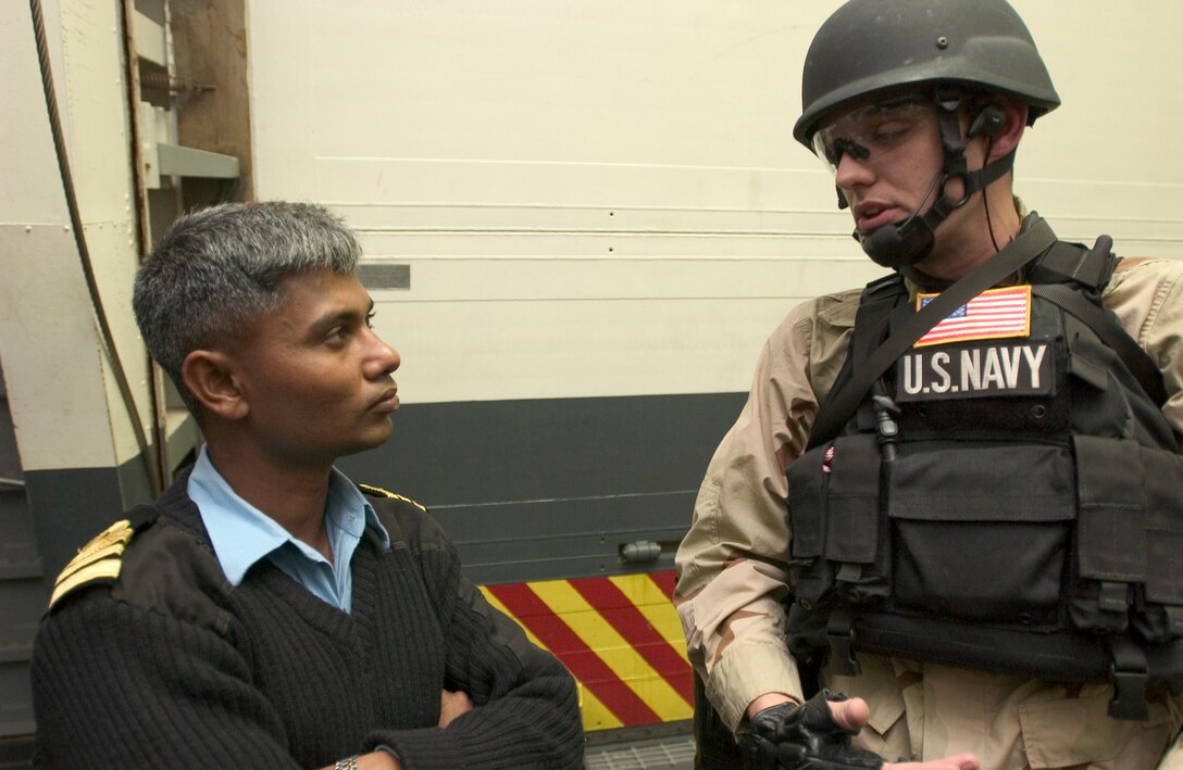Indian Navy Lt. Cmdr. Y. K. Singh, a gunnery officer from INS Ranjit ...