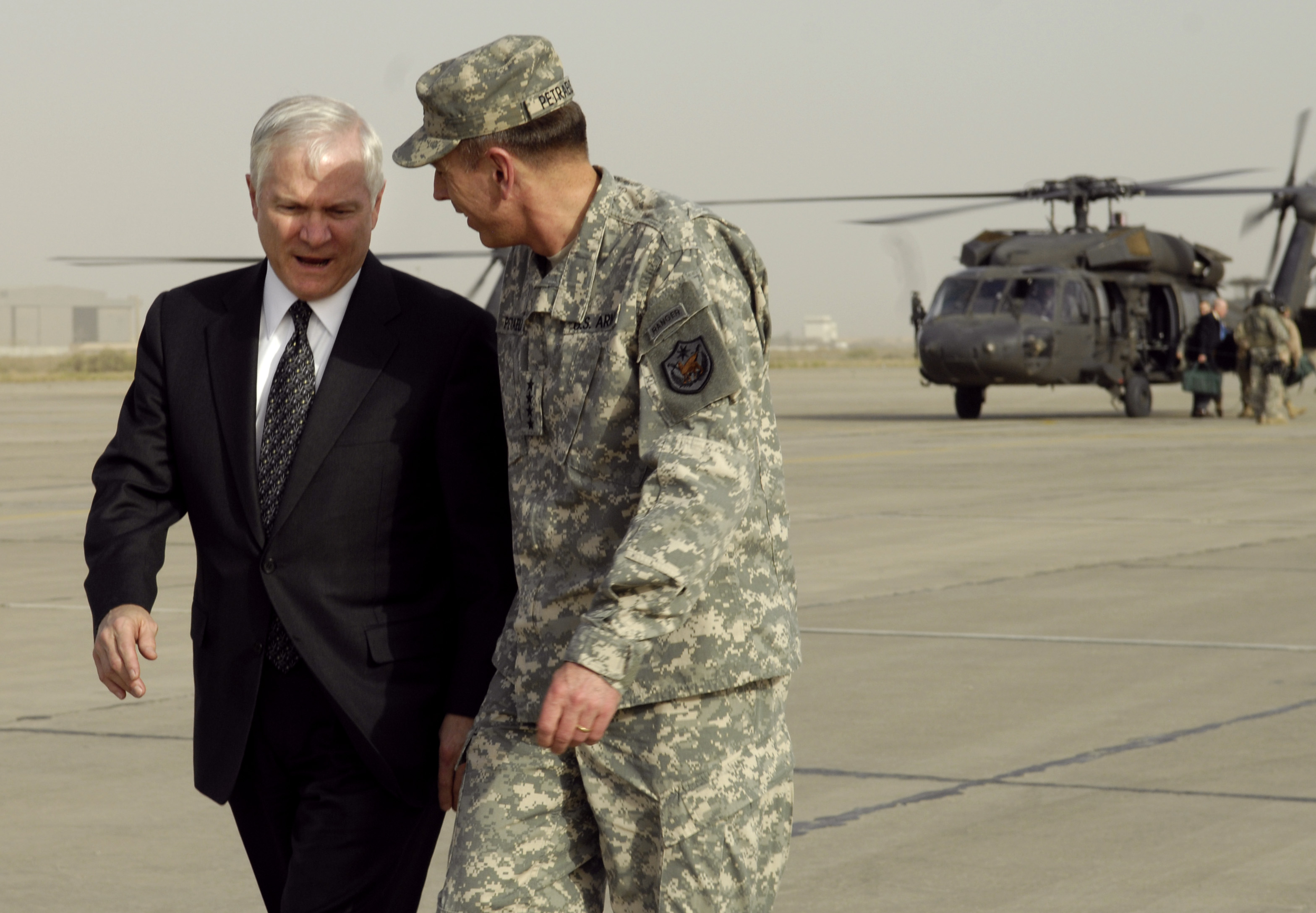 Defense Secretary Robert M. Gates speaks with Commander of ...
