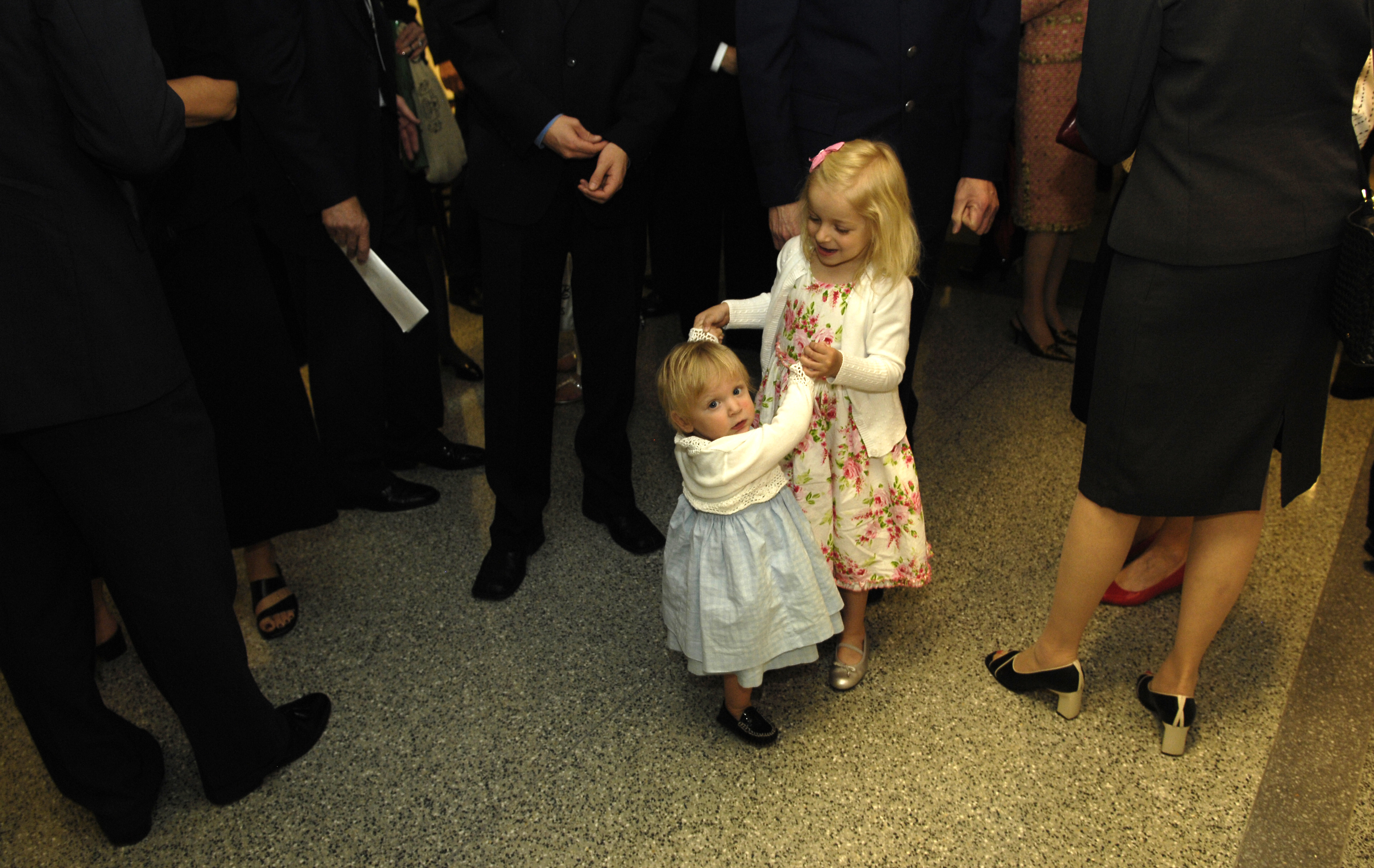 Girls dance after the portrait and legacy board unveiling ceremony at ...