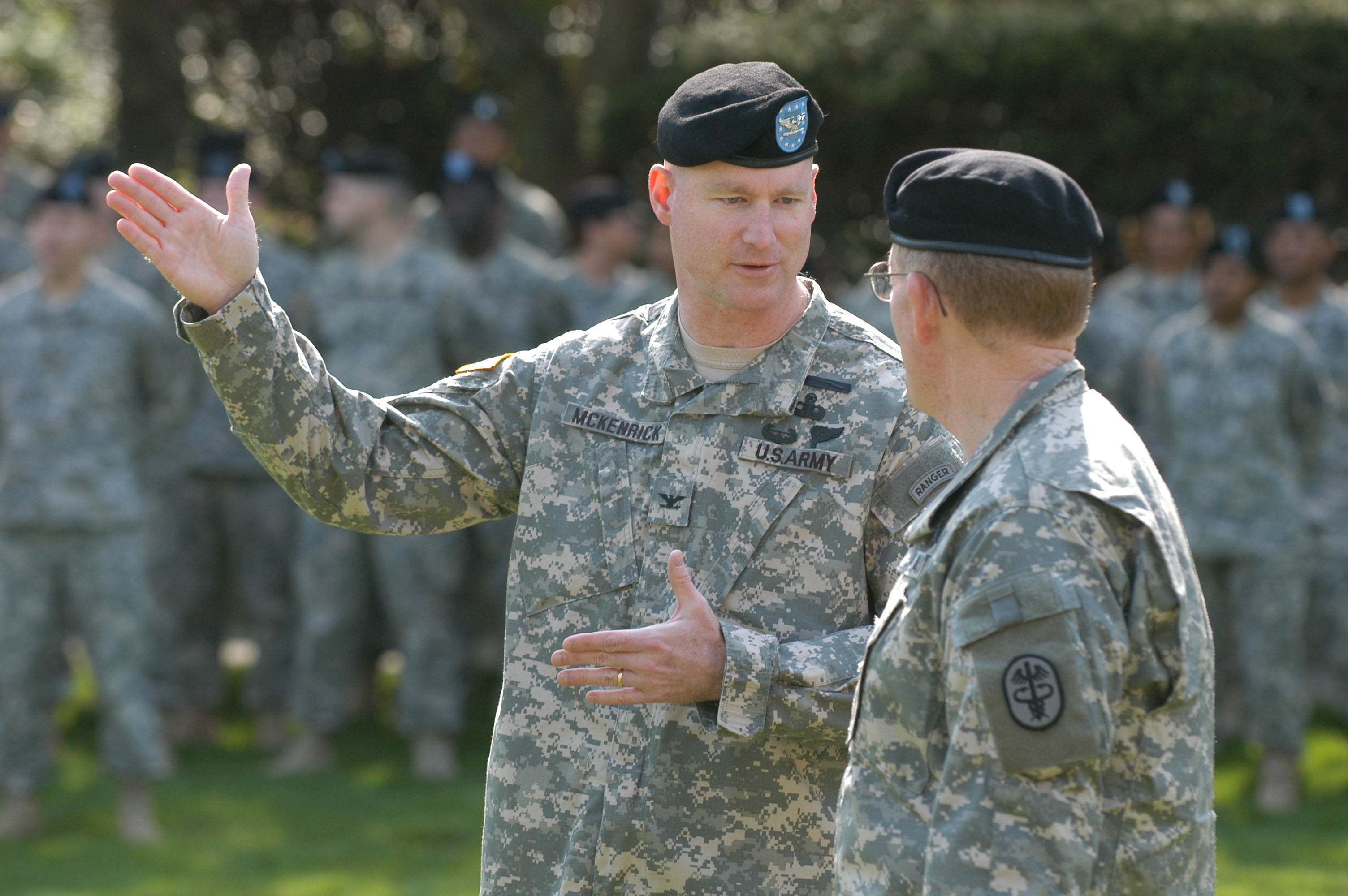 Army Col. Terrence McKenrick, left, Warrior Transition Brigade ...