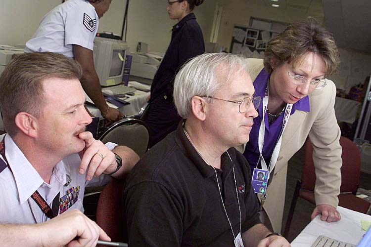 U.S. Air Force Master Sgt. Charles Reger, Kodak representative Pat ...