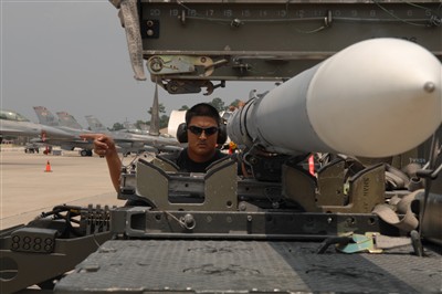 Staff Sgt. Victor Reyes secures an AIM-120 missile. | U.S. Department ...