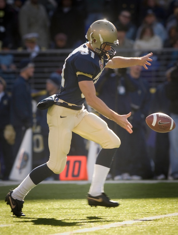 Naval Academy Senior Punter Greg Veteto kicks the ball during the ...