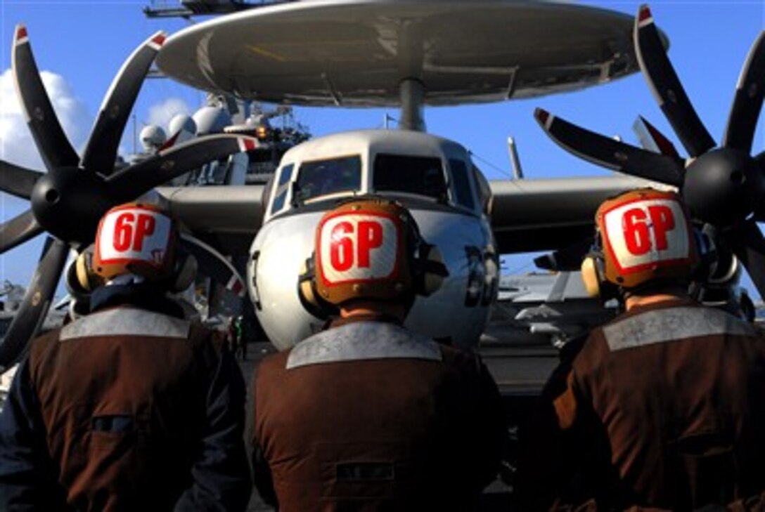 U.S. Navy plane captains await further signals. | U.S. Department of War