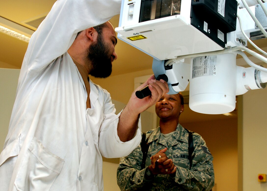 Capt. Hamayoon, an Afghan National Army X-ray technician, demonstrates ...