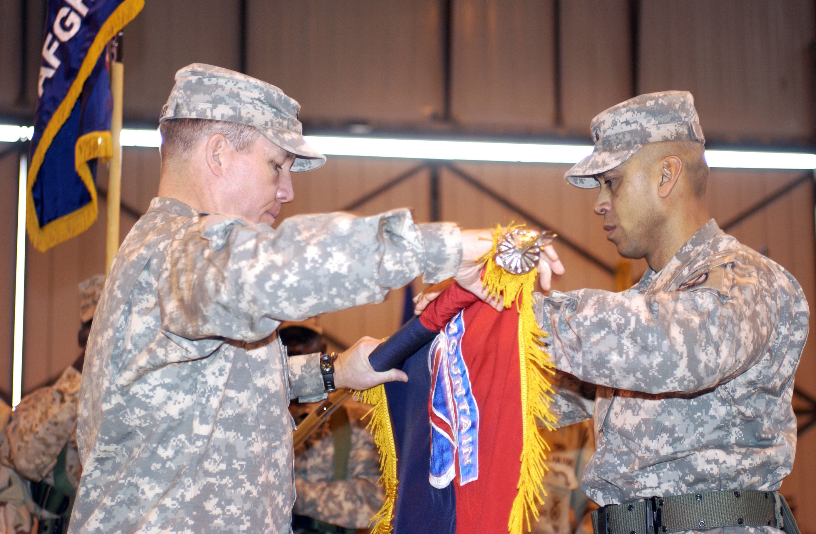 Army Maj. Gen. Benjamin Freakley (left), commander of the 10th Mountain ...