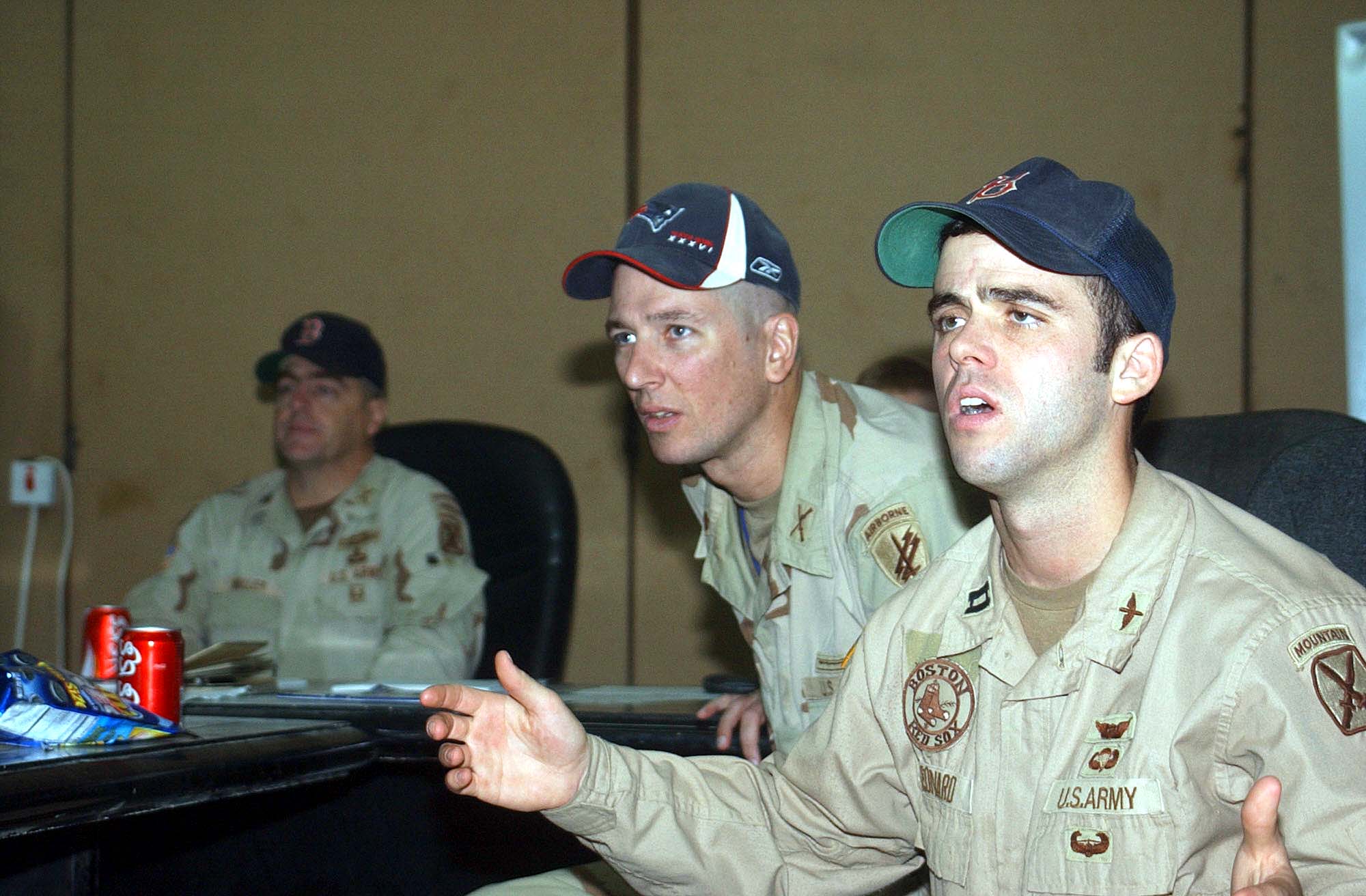 From the right, Army Capt. Ryan Leonard, Maj. Rick Smudin and Col. Mark ...
