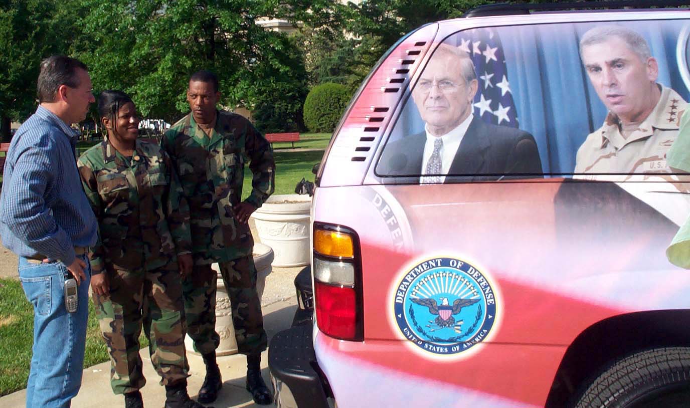 Ed Negrin discusses his trucks' red, white and blue design theme with ...