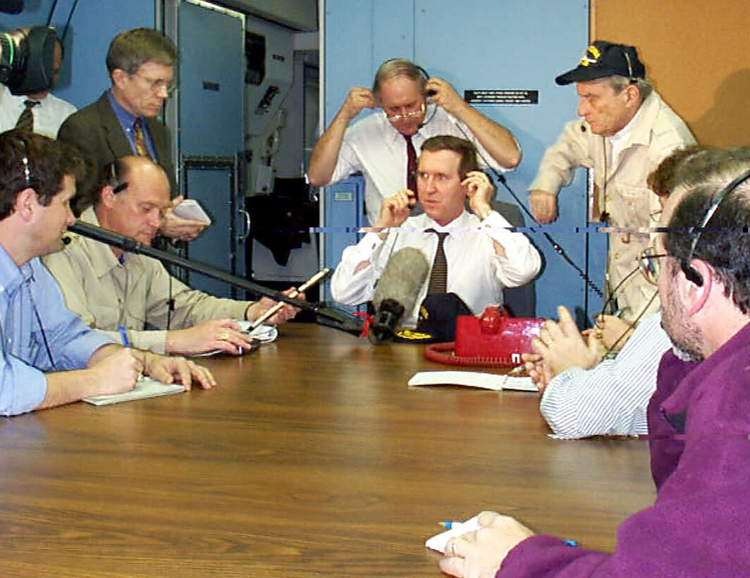 About a dozen reporters interview Defense Secretary William S. Cohen ...