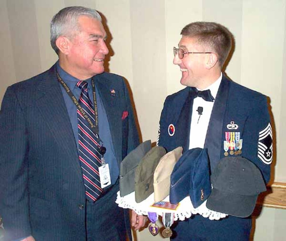 Holding his special display of caps representing each service, Air ...