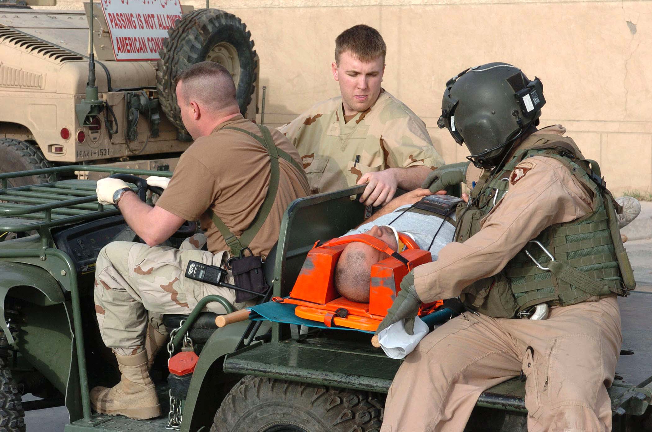 Sgt. Marcus Miller, far right, a flight medic with the 50th Medical ...