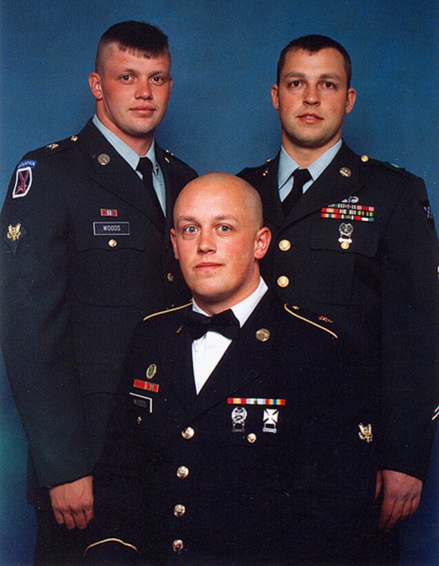 Three of five Woods boys serving in the Army are, from left, Spc ...