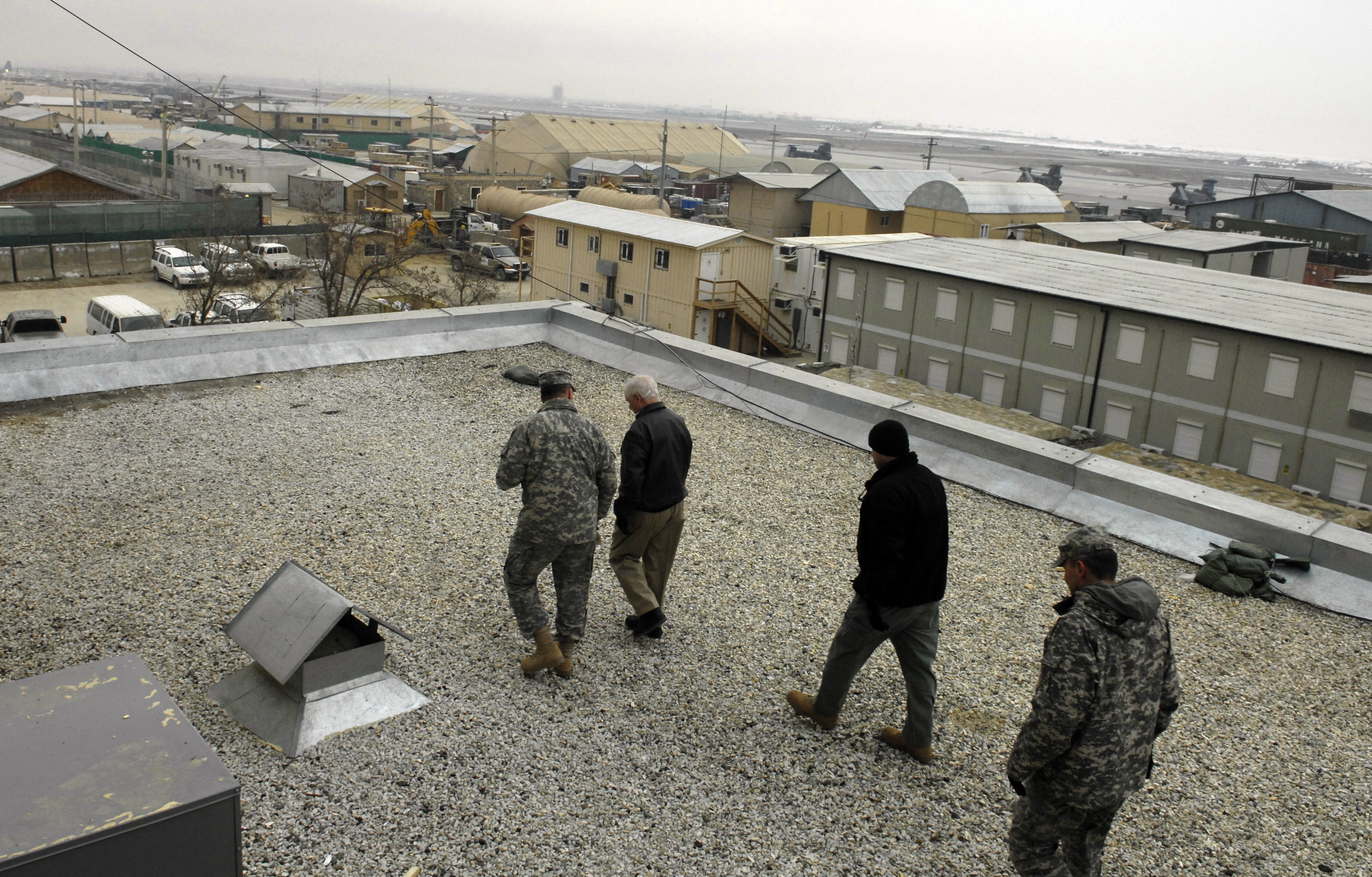 U.S. Army Maj. Gen. Benjamin Freakley walks with Defense Secretary ...