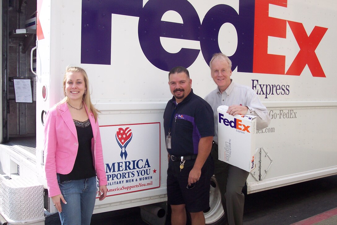 From left, Shauna Fleming, Peter Angel, and Paul Holton stand in front ...