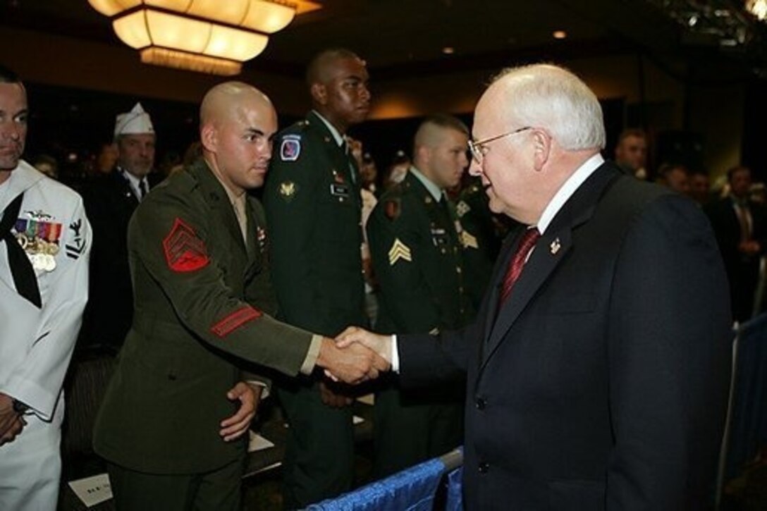 Vice President Richard Cheney shakes hands with Marine Sgt. Justin ...