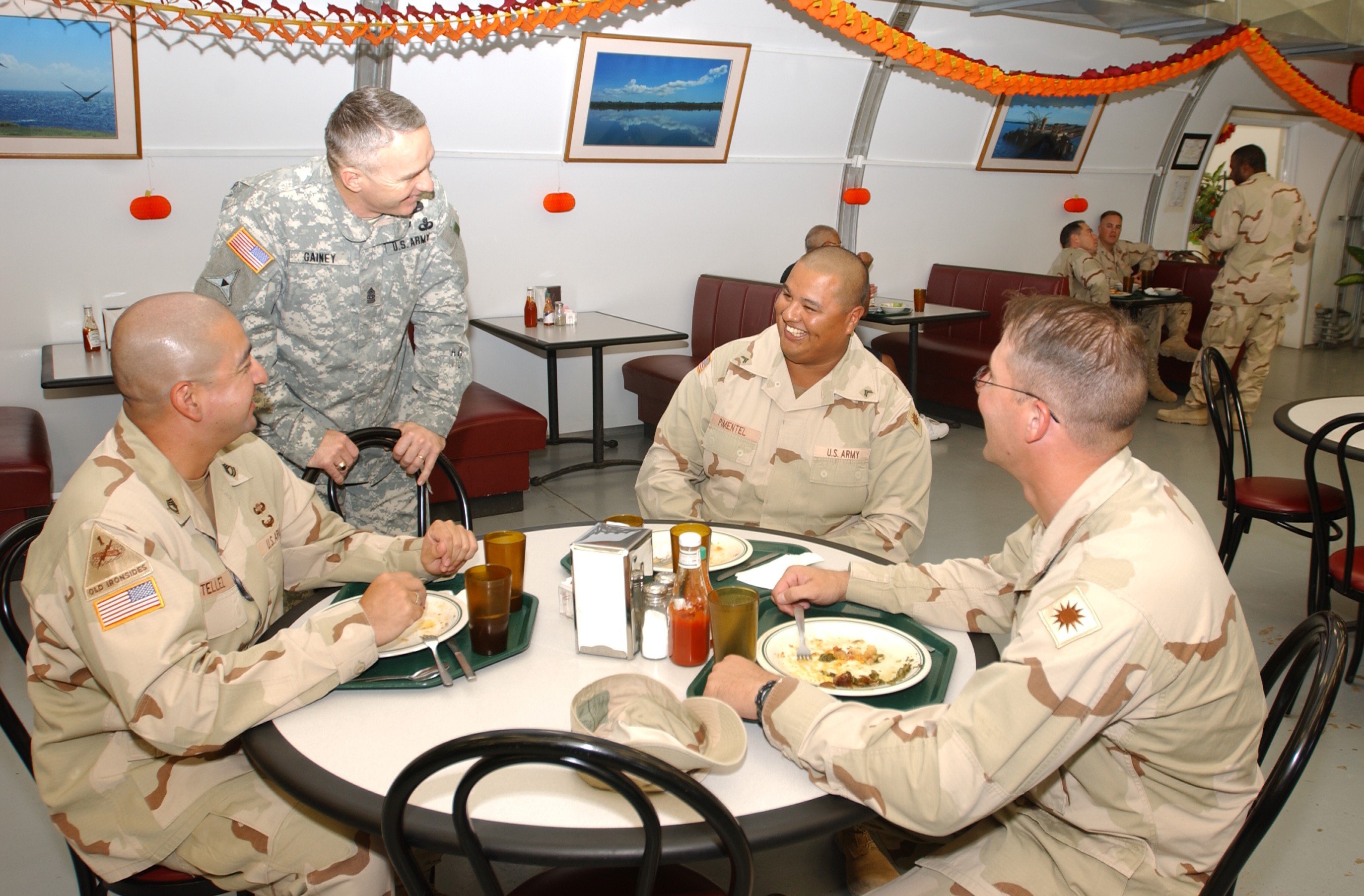 Army Command Sgt. Maj. William J. Gainey (standing), senior enlisted ...