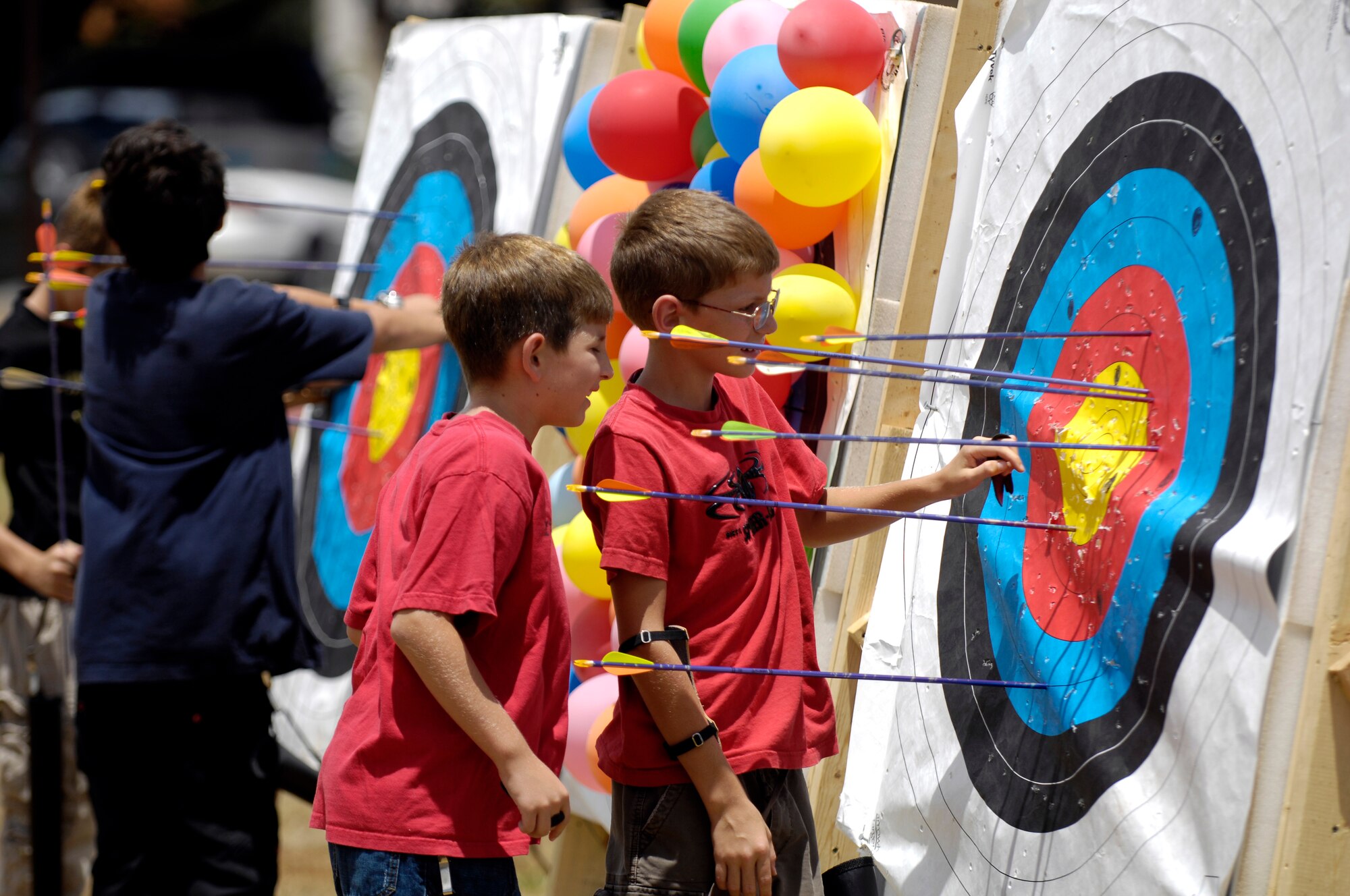 Archery lessons taught at Community Activity Center > 15th Wing ...