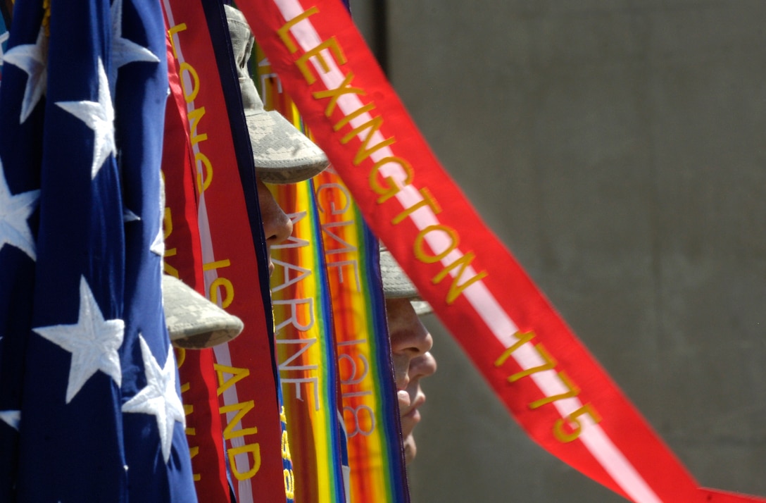 Members of the Color Guard for the 3rd Infantry Division stand at ...